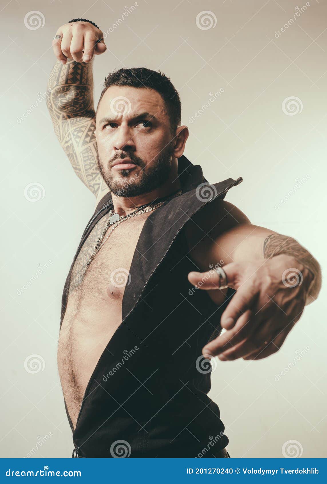 Handsome Confident Man. Serious Guy Posing in Studio. Stock Photo ...