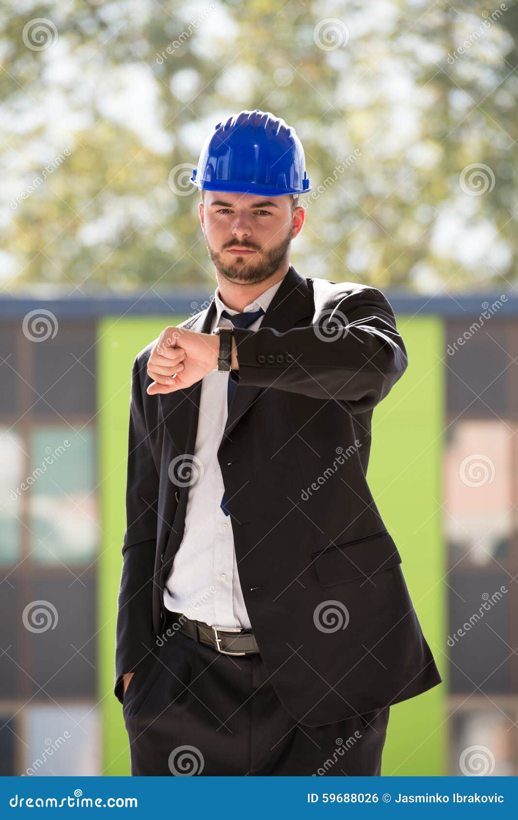 Handsome Construction Manager Looking at His Watch Stock Photo - Image ...