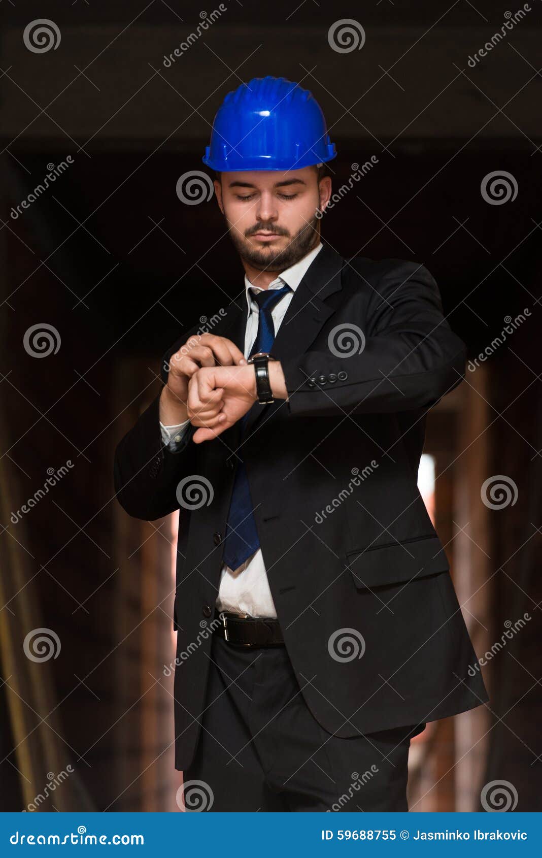 Handsome Construction Manager Looking at His Watch Stock Image - Image ...