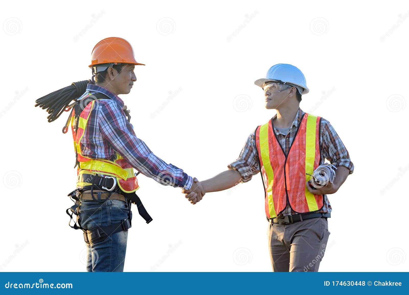 Handsome Construction Workers in Protective Helmets and Vests are ...
