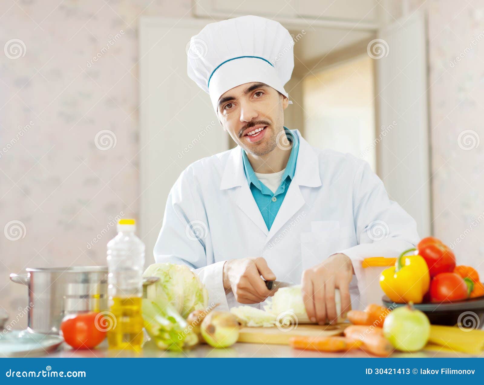 Handsome Cook Cooking in Kitchen Stock Image - Image of cuts, health ...