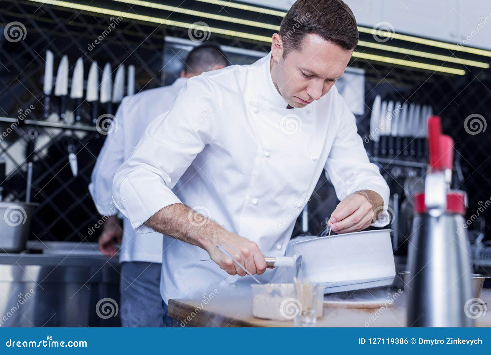 Handsome Cook Preparing a Tasty Unusual Dish Stock Photo - Image of ...