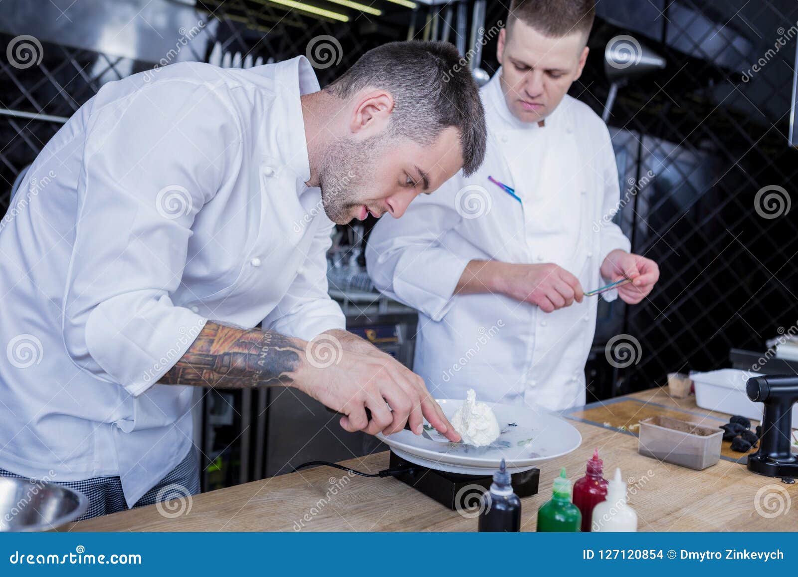 Handsome Cooks Dealing with Different New Recipes Stock Photo - Image ...