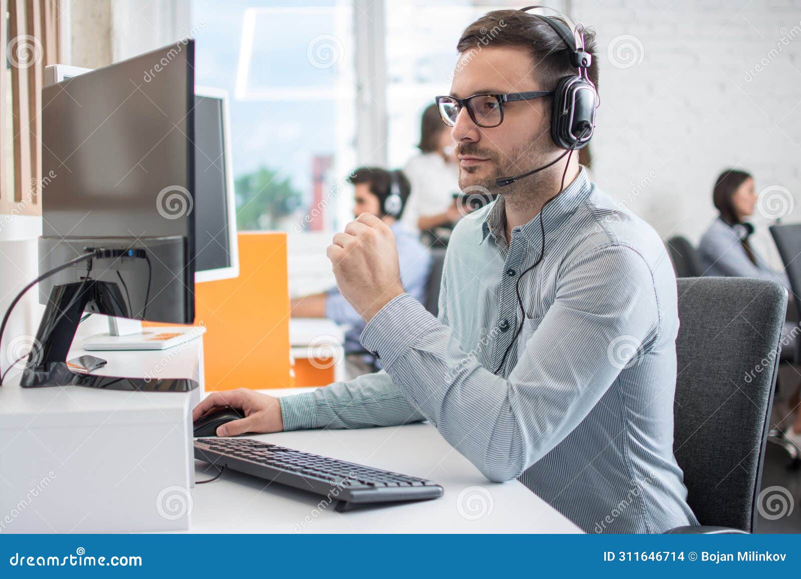 Handsome Customer Service Support Operator Man with Headphones and ...