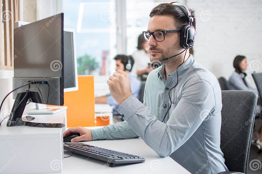Handsome Customer Service Support Operator Man with Headphones and ...