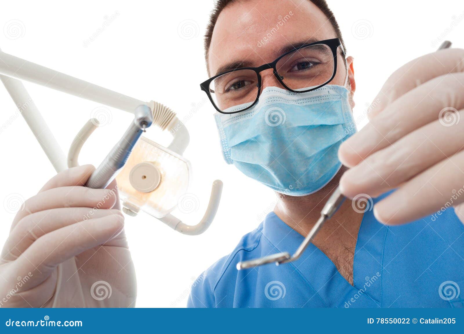 Handsome Dentist Making Dental Inspection with Tools in Hand Stock ...