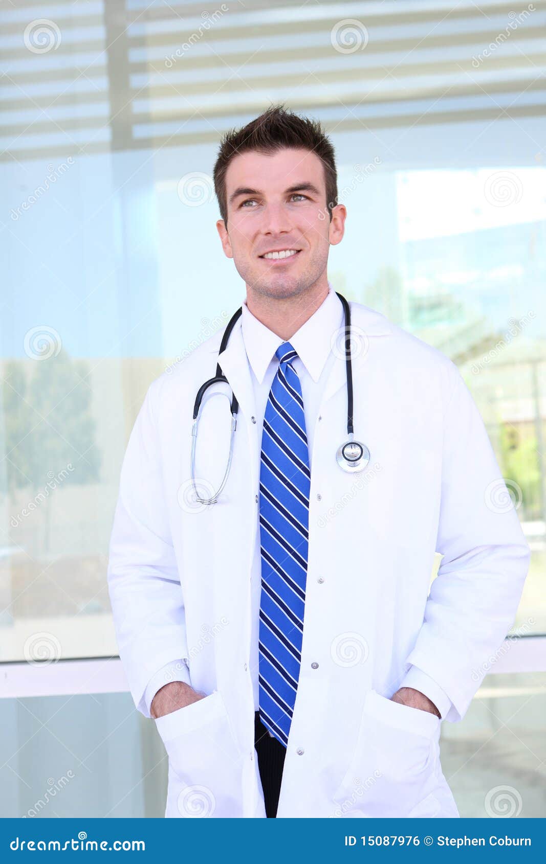 Handsome Doctor at Hospital Stock Photo - Image of medical, clinic ...