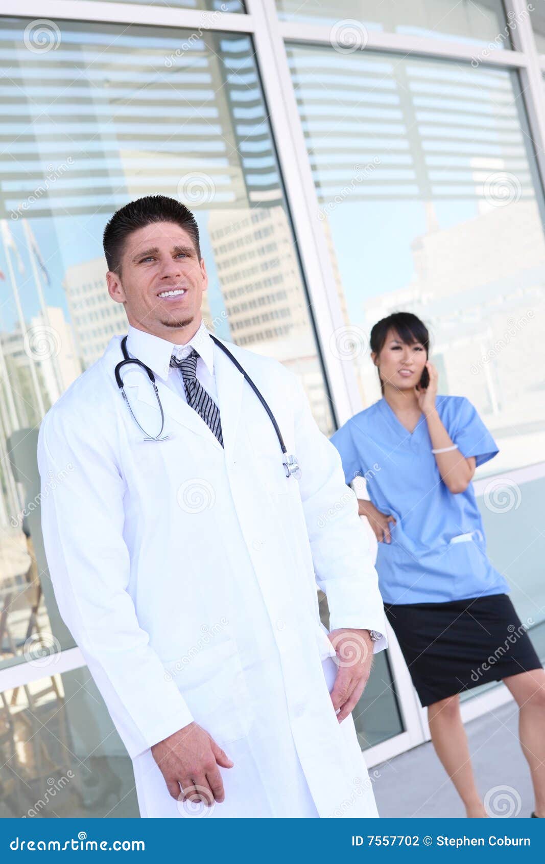 Handsome Doctor Outside Hospital Stock Photo - Image of stethoscope ...