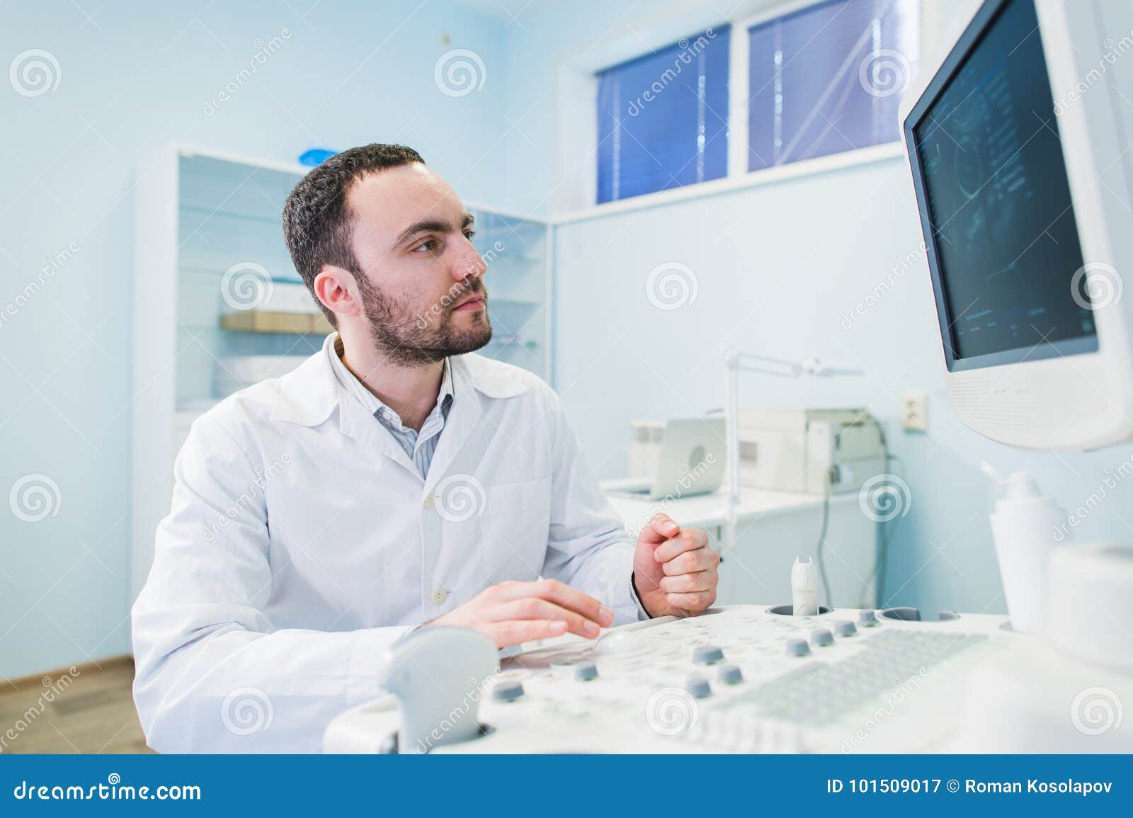 Handsome Doctor Using an Ultrasound Machine Stock Image - Image of ...