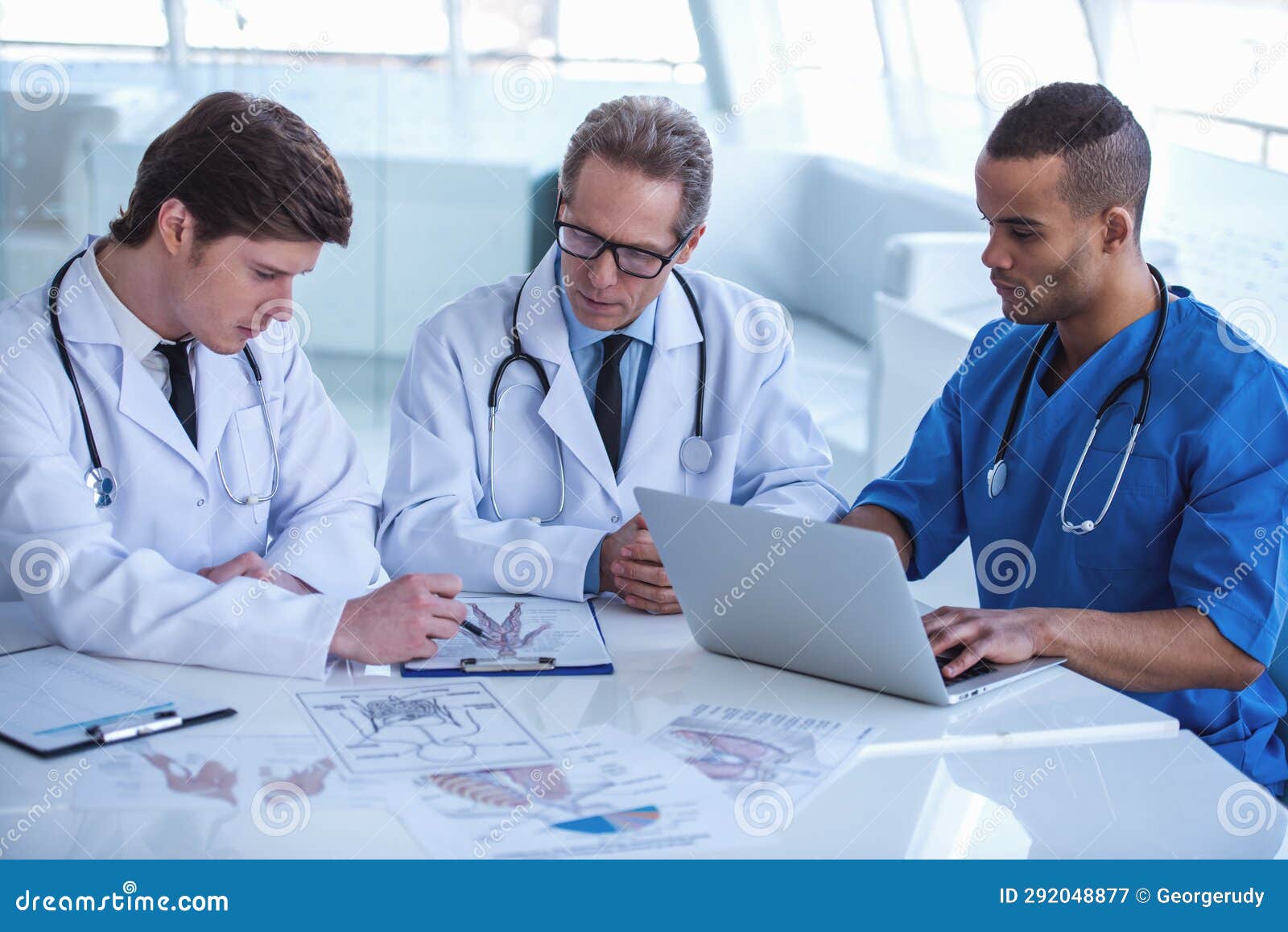 Handsome doctors working stock image. Image of male - 292048877