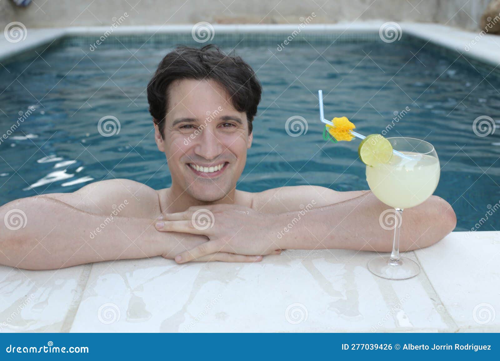 Handsome Dude Drinking a Cocktail in the Pool Stock Photo - Image of ...