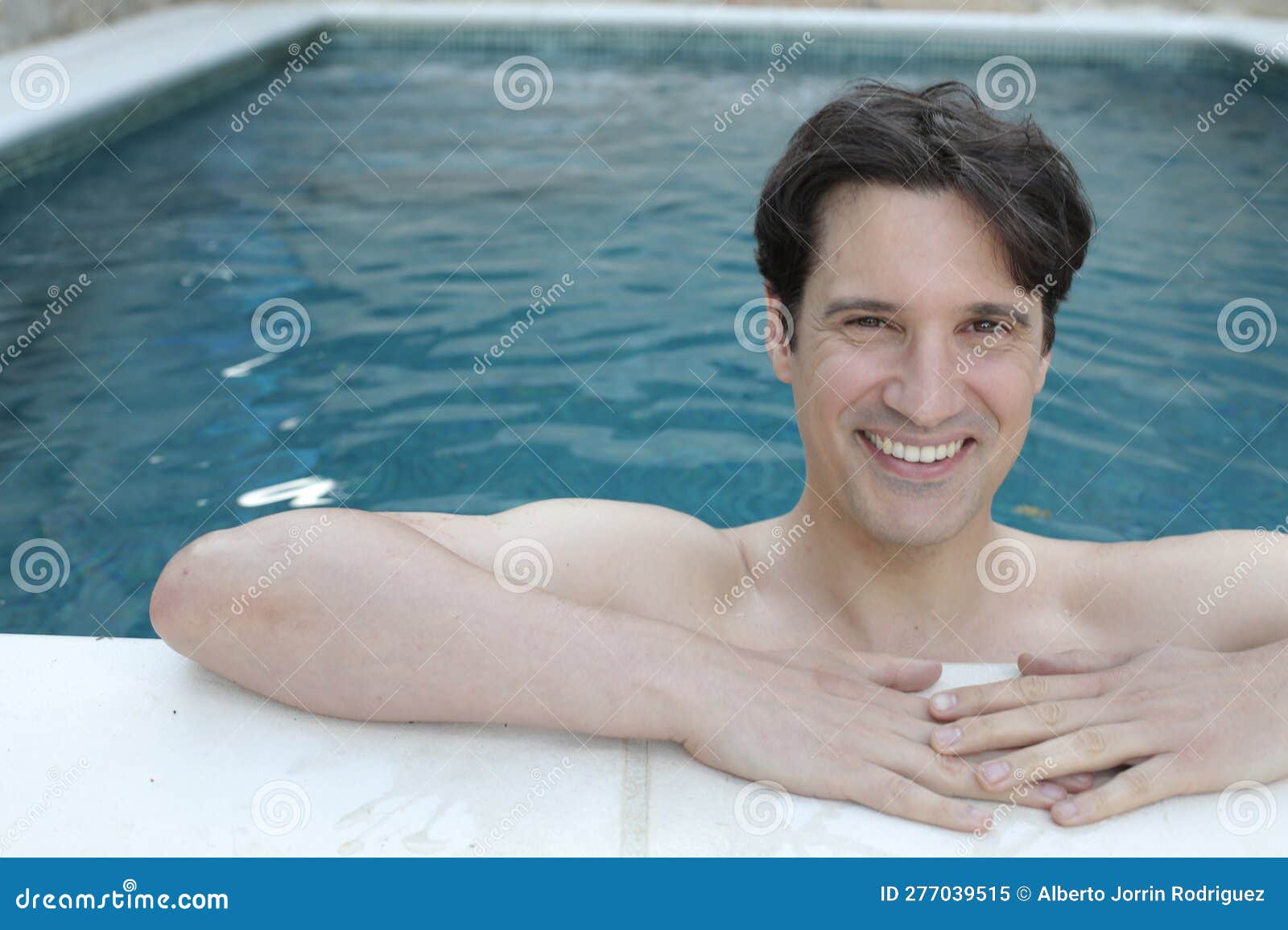 Handsome dude in the pool stock image. Image of enjoy - 277039515
