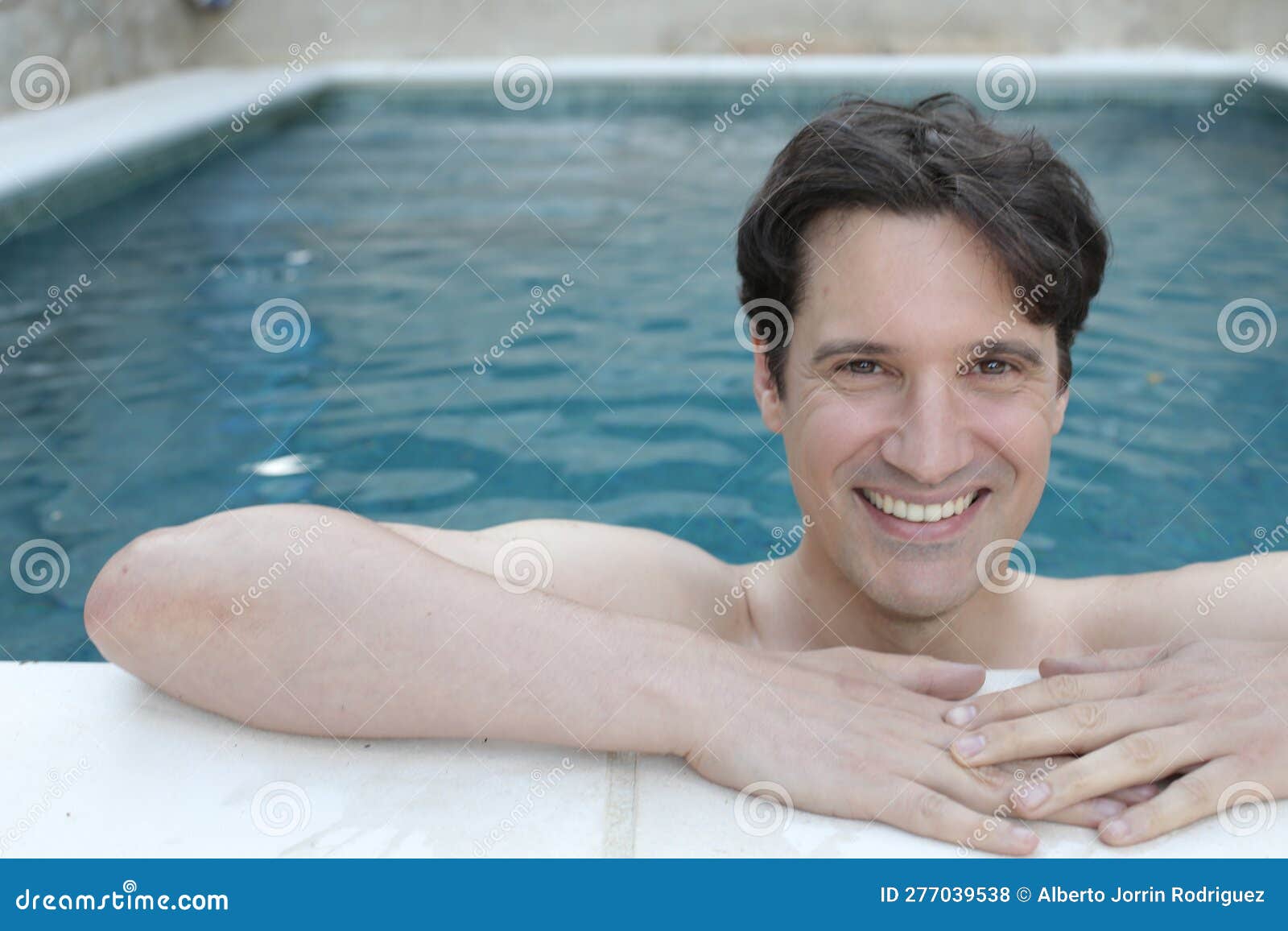 Handsome dude in the pool stock photo. Image of relaxation - 277039538