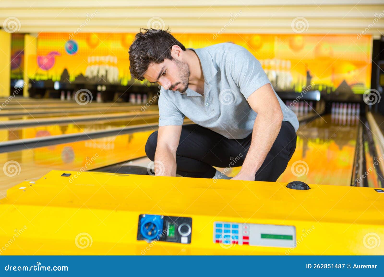 Handsome Employee Maintaining Bowling Alleys Stock Image - Image of ...