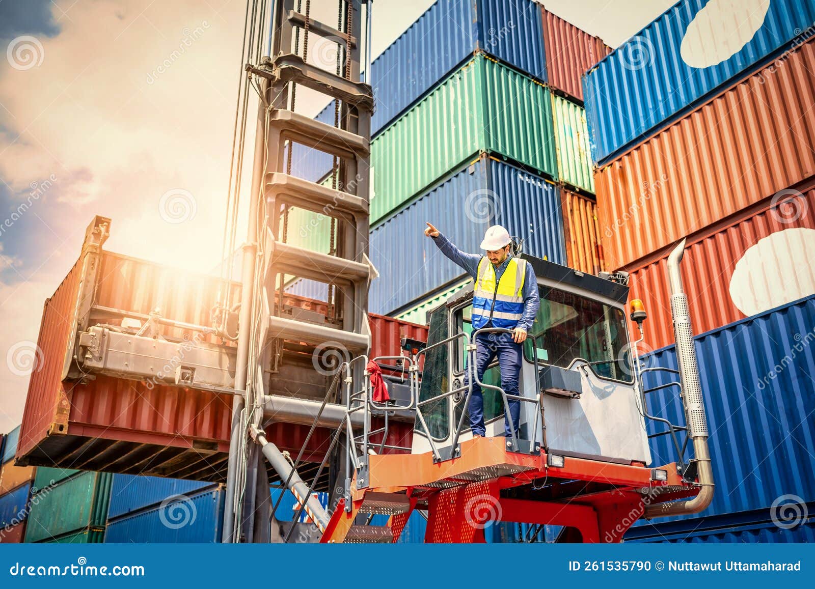 Handsome Engineer or Foreman Wears PPE Checking Container Storage with ...