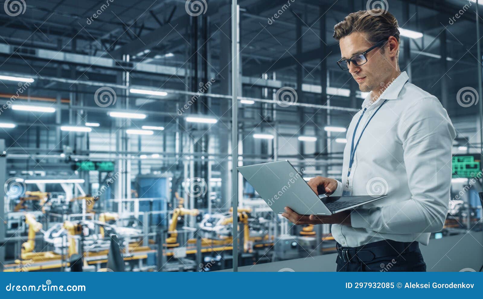 Handsome Engineer in Glasses and White Shirt Using Laptop Computer and ...