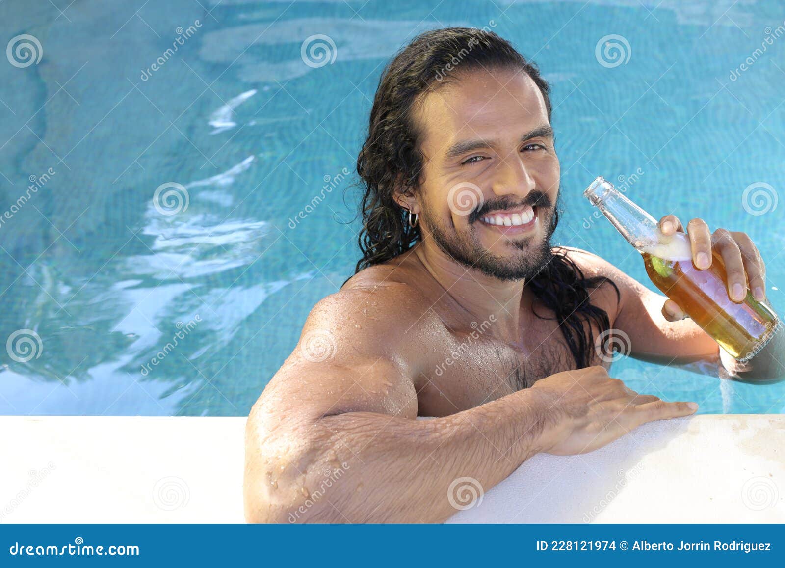 Handsome Ethnic Young Man Drinking Beer in Swimming Pool Stock Photo ...