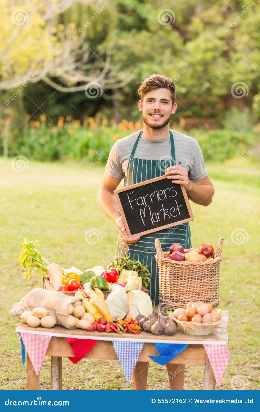 Handsome Farmer Standing at His Stall and Holding Chalkboard Stock ...