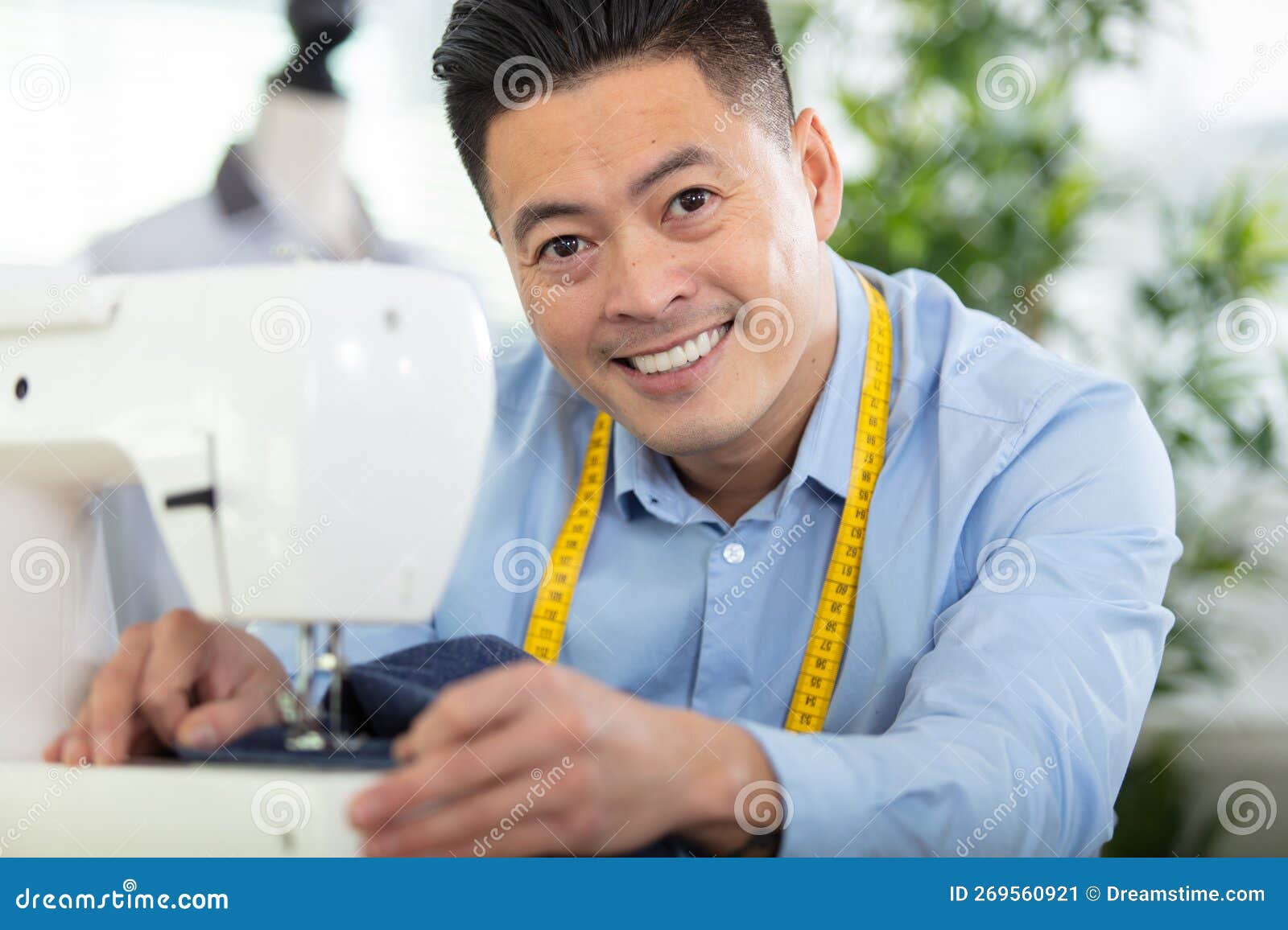 Handsome Fashion Designer Sewing with Sewing Machine Stock Image ...