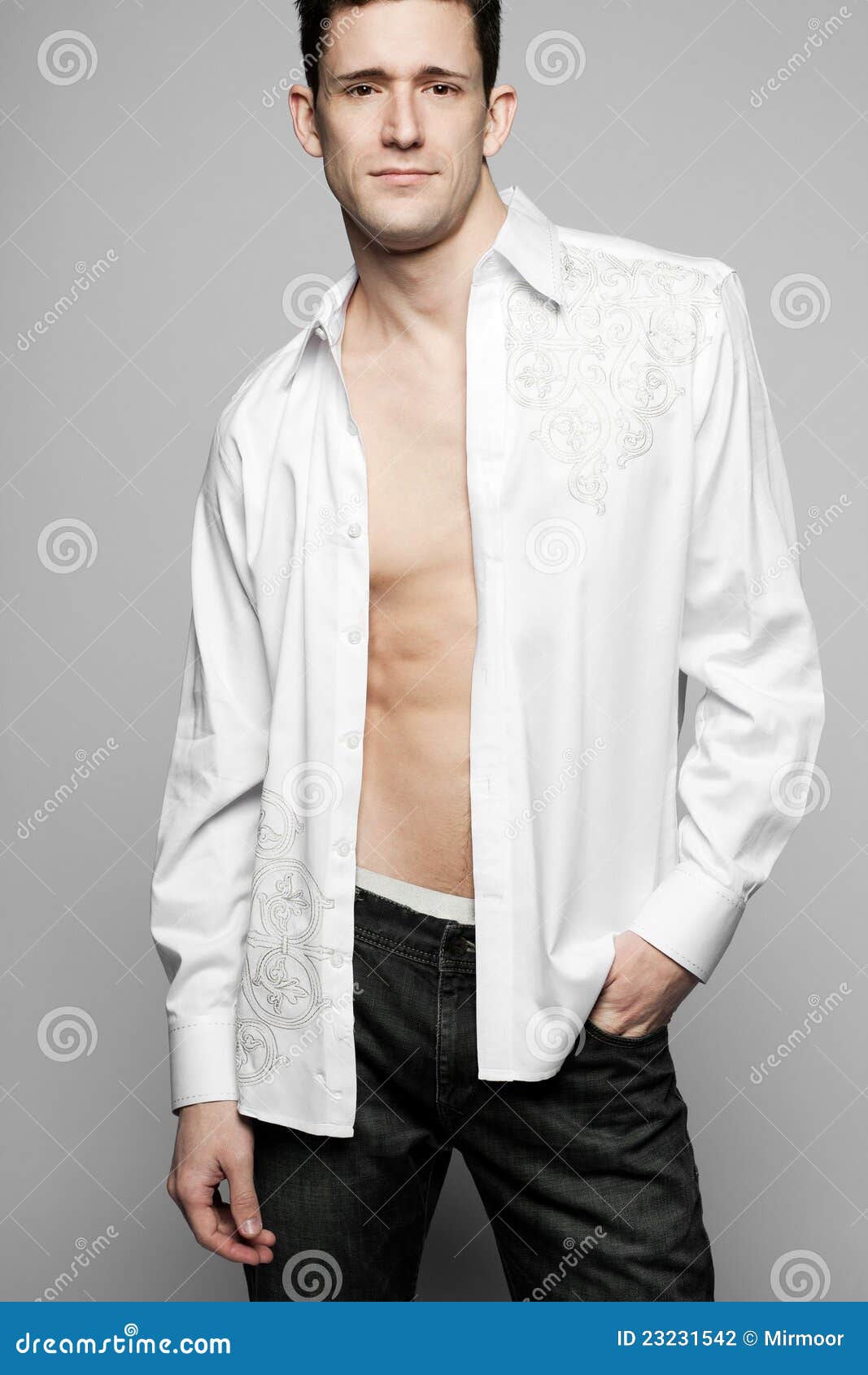Handsome Fashion Model Posing in White Shirt. Stock Photo - Image of ...