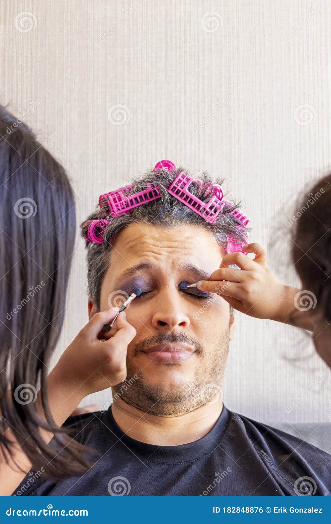 Handsome Father is Being Makeup by the Hands of His Daughters Stock ...
