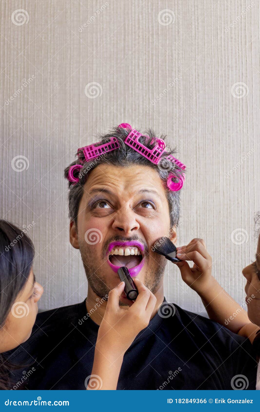 Handsome Father is Being Makeup by the Hands of His Daughters Stock ...