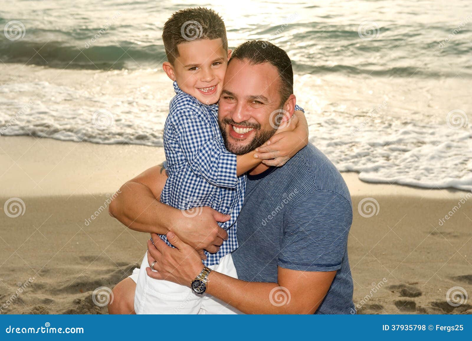 Handsome father and son stock photo. Image of hugging - 37935798