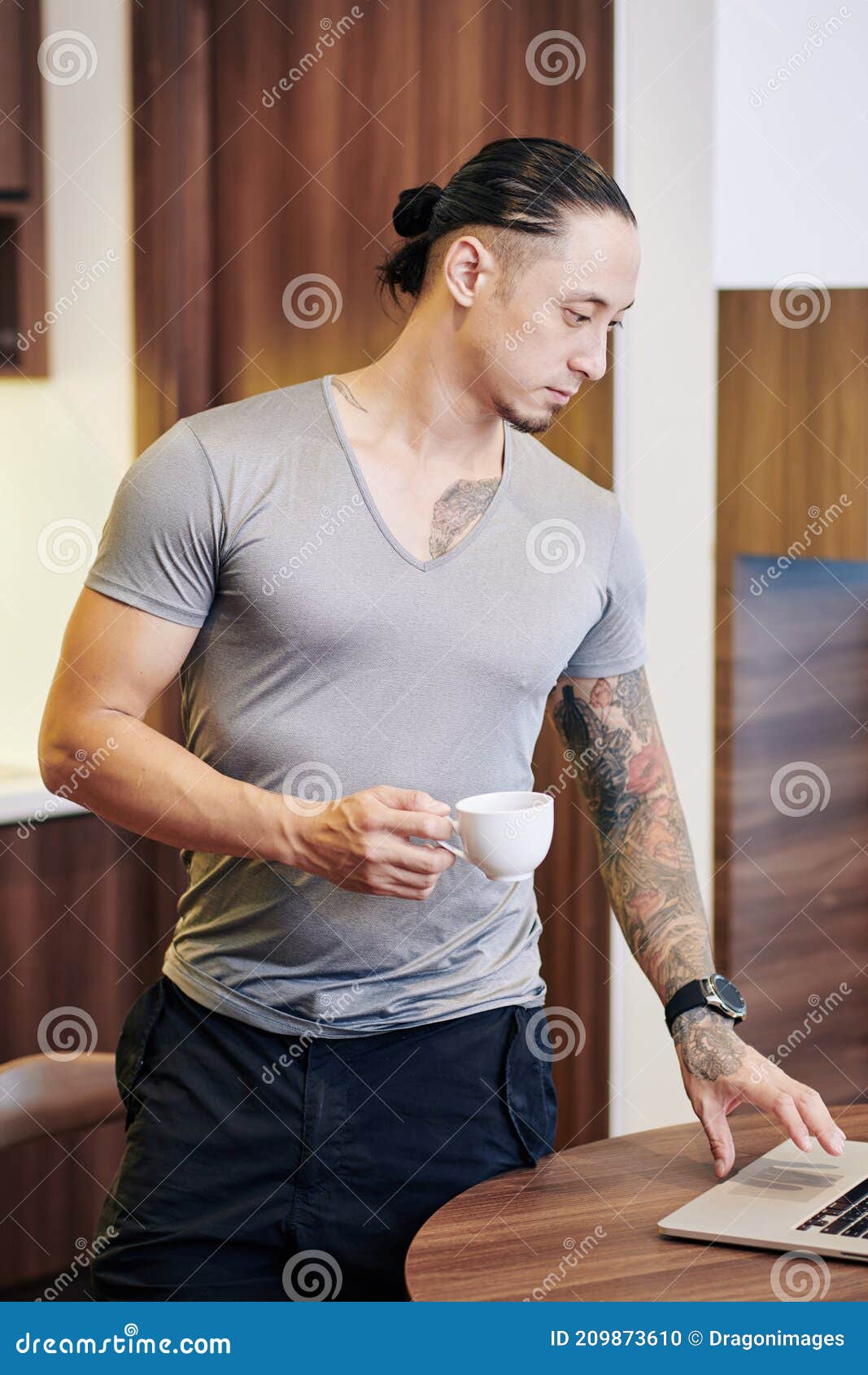 Man pushing laptop button stock photo. Image of occupation - 209873610