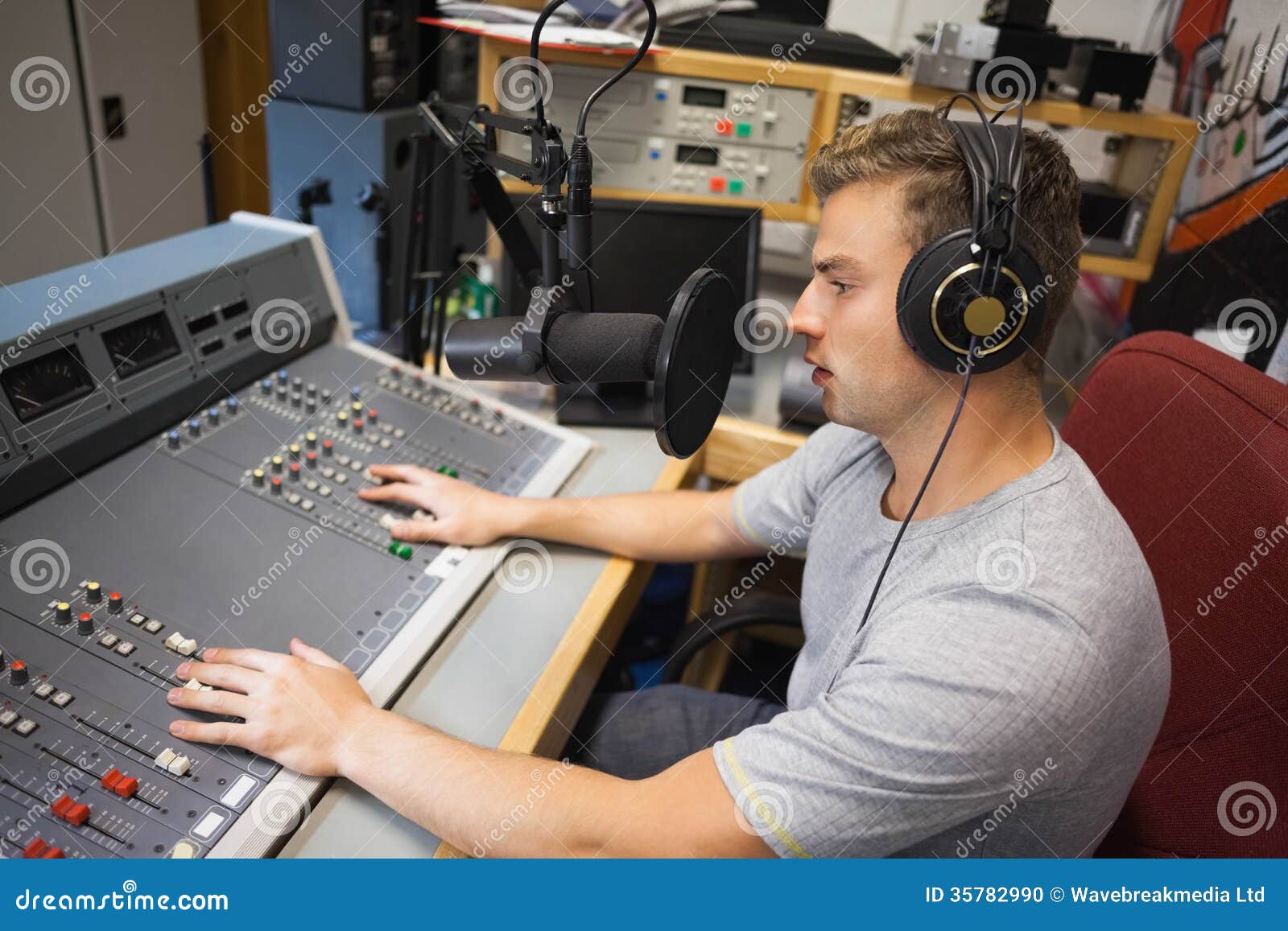 Handsome Focused Radio Host Moderating Stock Photo - Image of recording ...