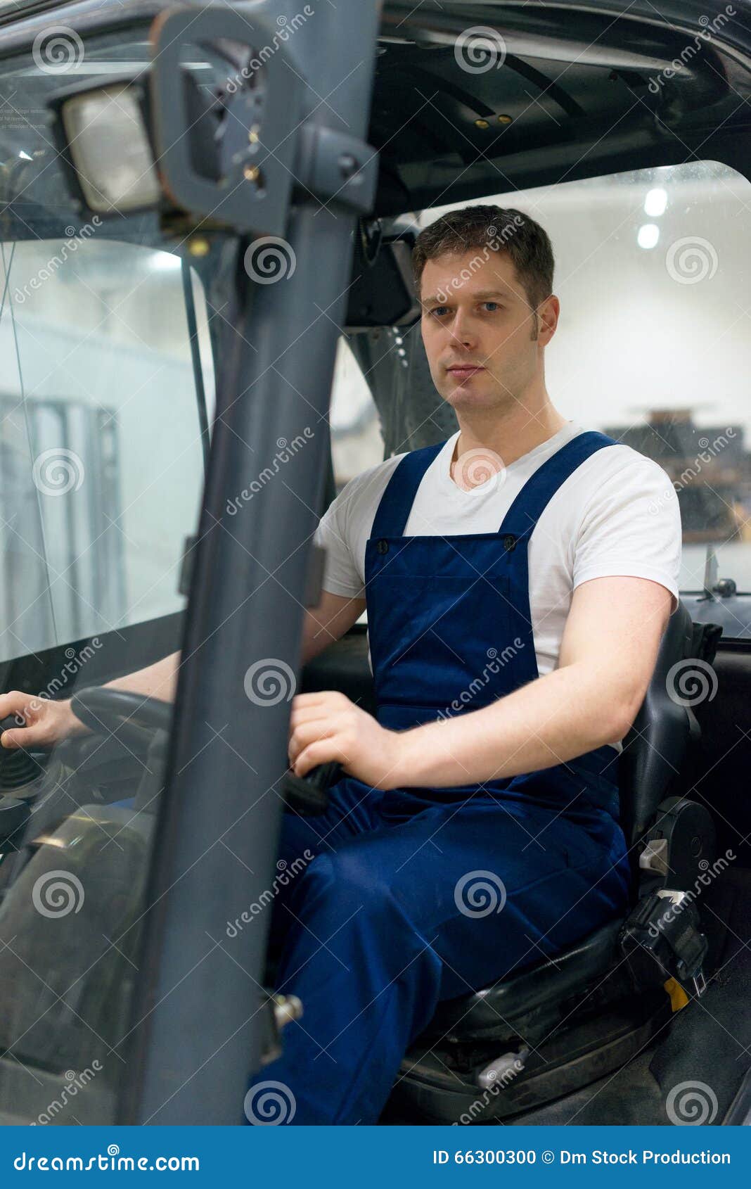 Handsome Forklift Operator. Stock Photo - Image of lifting, forklift ...