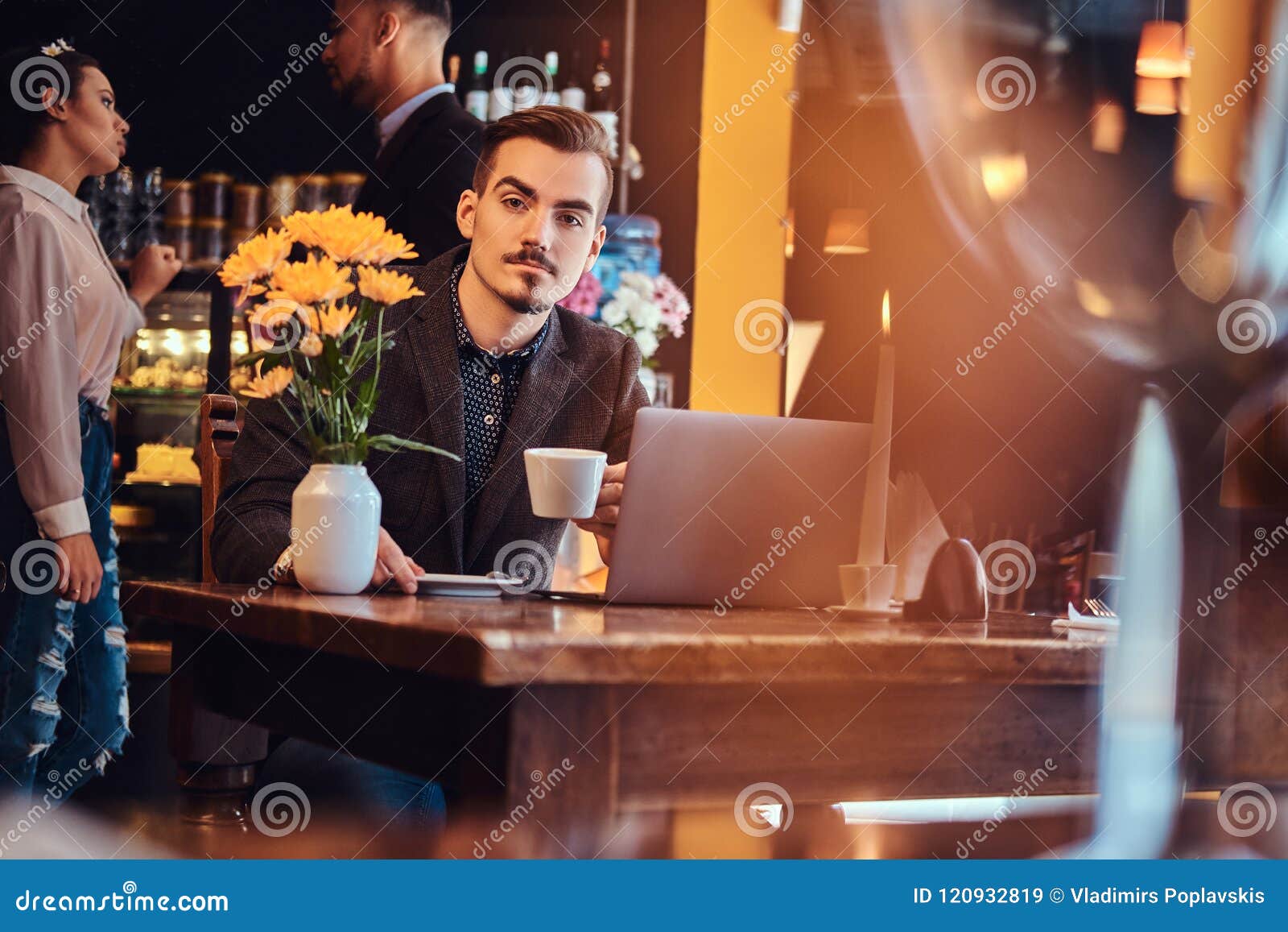 Handsome Freelancer Man With Stylish Beard And Hair Dressed In A Black