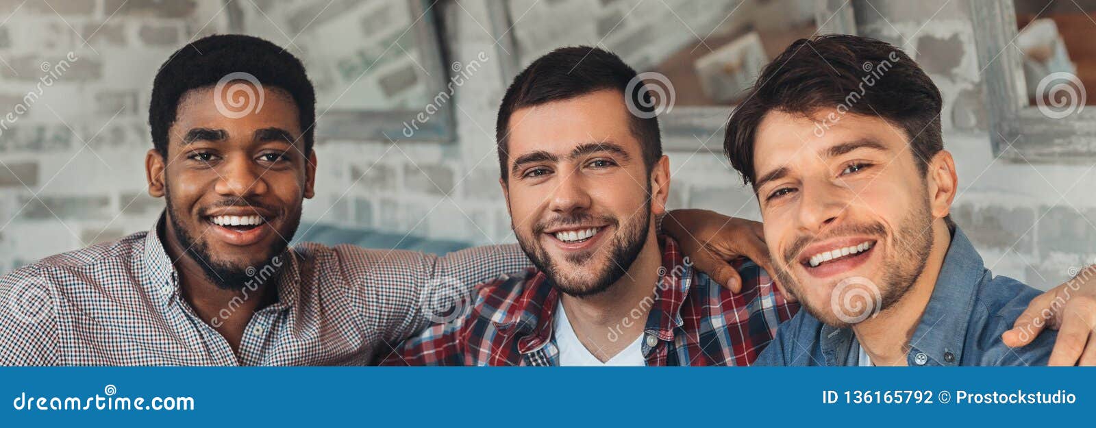 Two Handsome Friends Giving Each Other A High-five Royalty-Free Stock ...