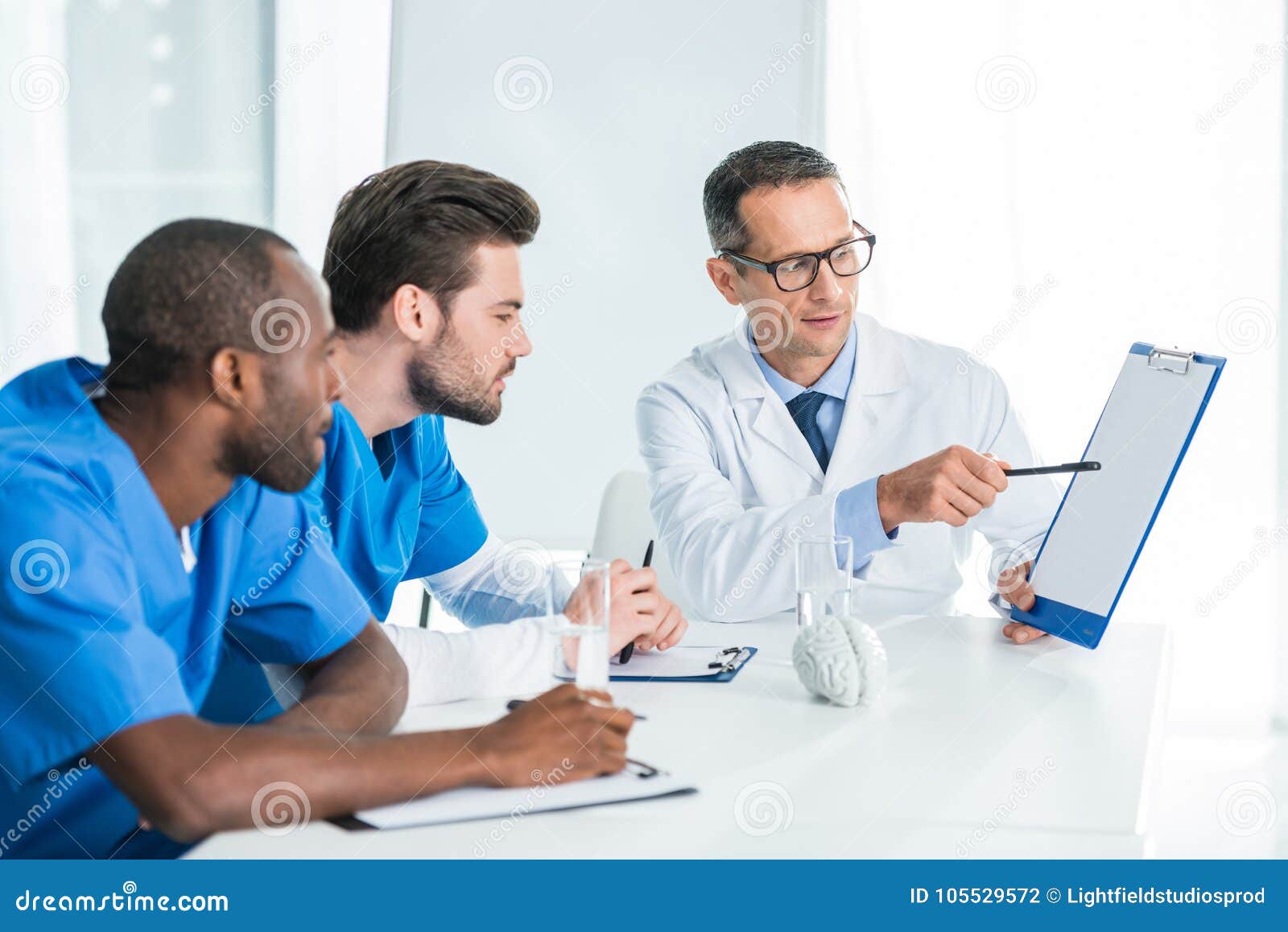Team of Doctors Having Conversation Stock Photo - Image of discuss ...