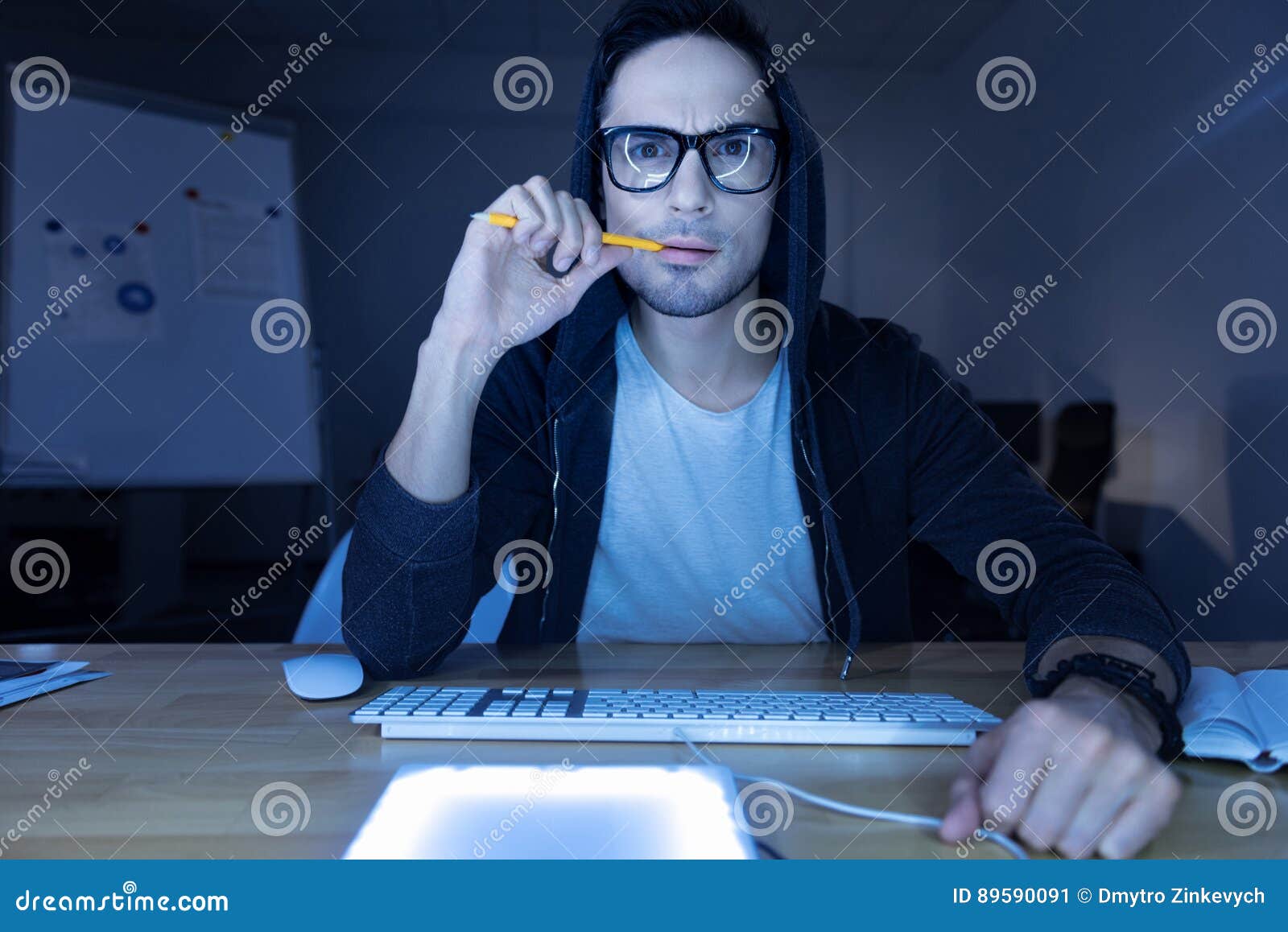 Handsome Genius Hacker Biting a Pencil Stock Image - Image of device ...