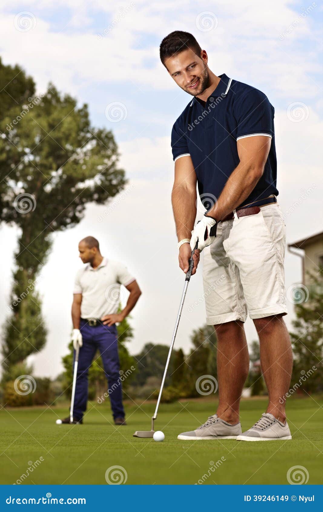 Handsome golfer holing stock image. Image of adult, ball - 39246149