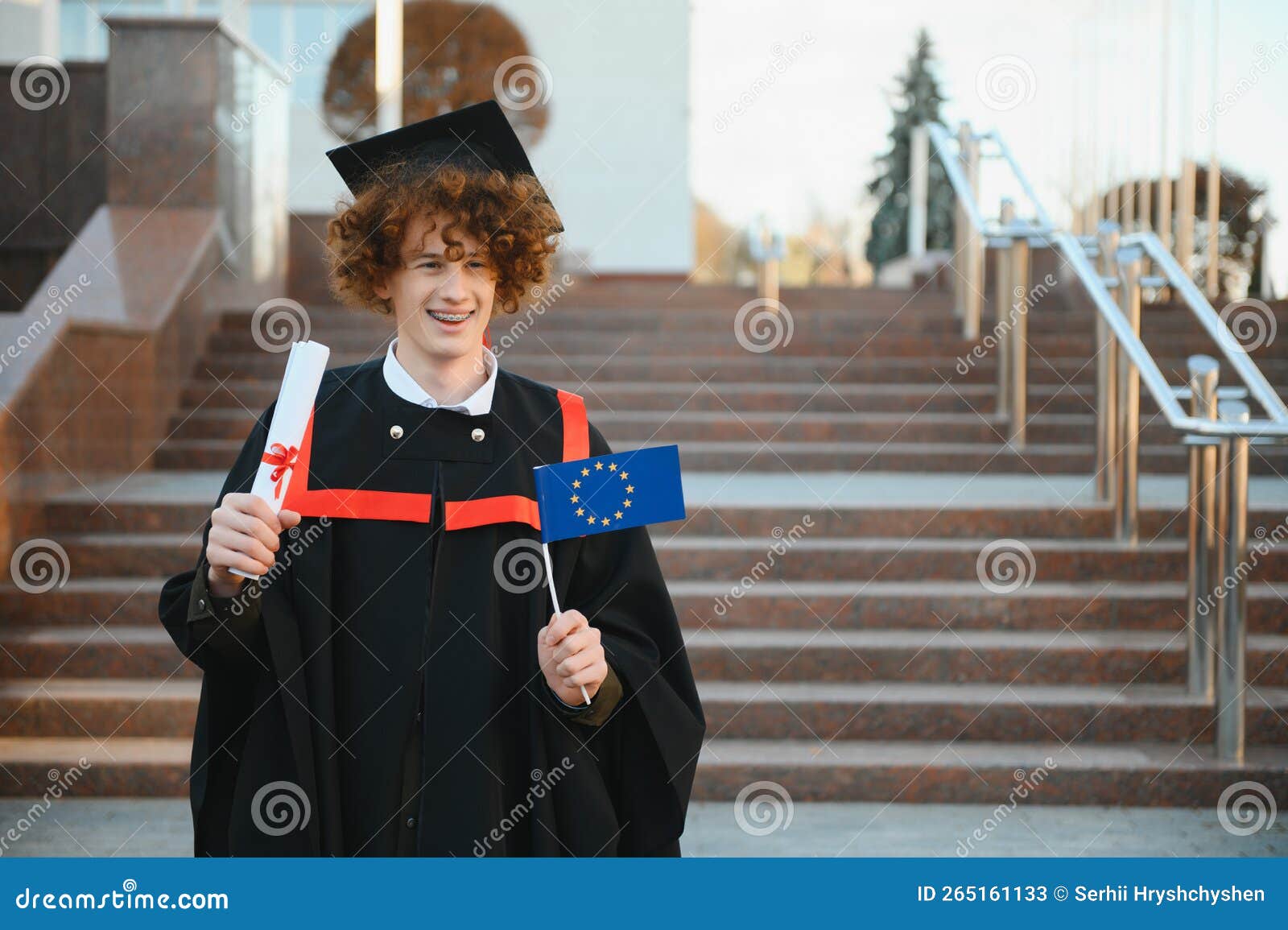 Handsome Graduate In Graduation Glow With Diploma. Royalty-Free Stock ...
