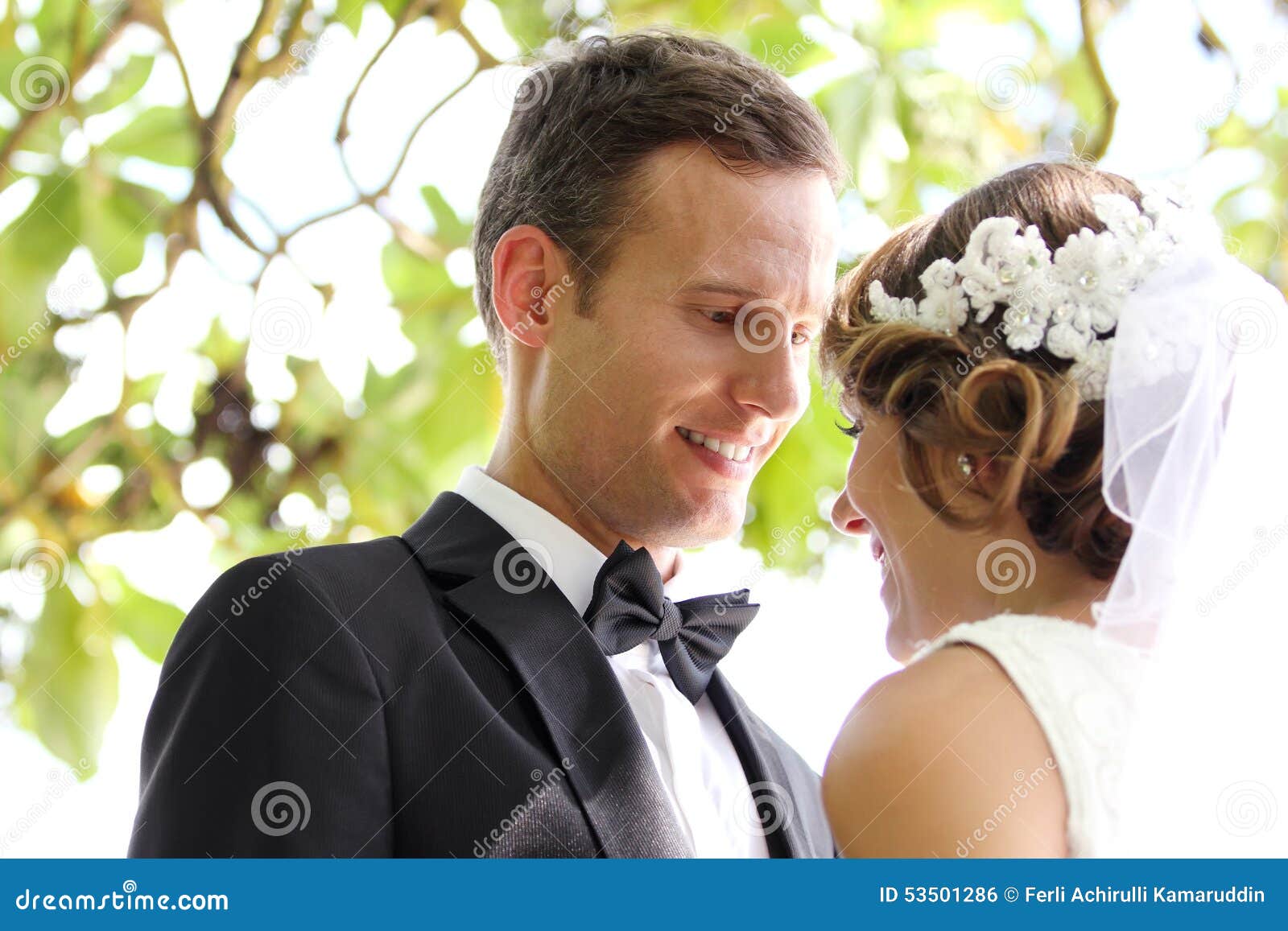 Handsome Groom Looking Lovingly into Bride Eyes Stock Photo - Image of ...