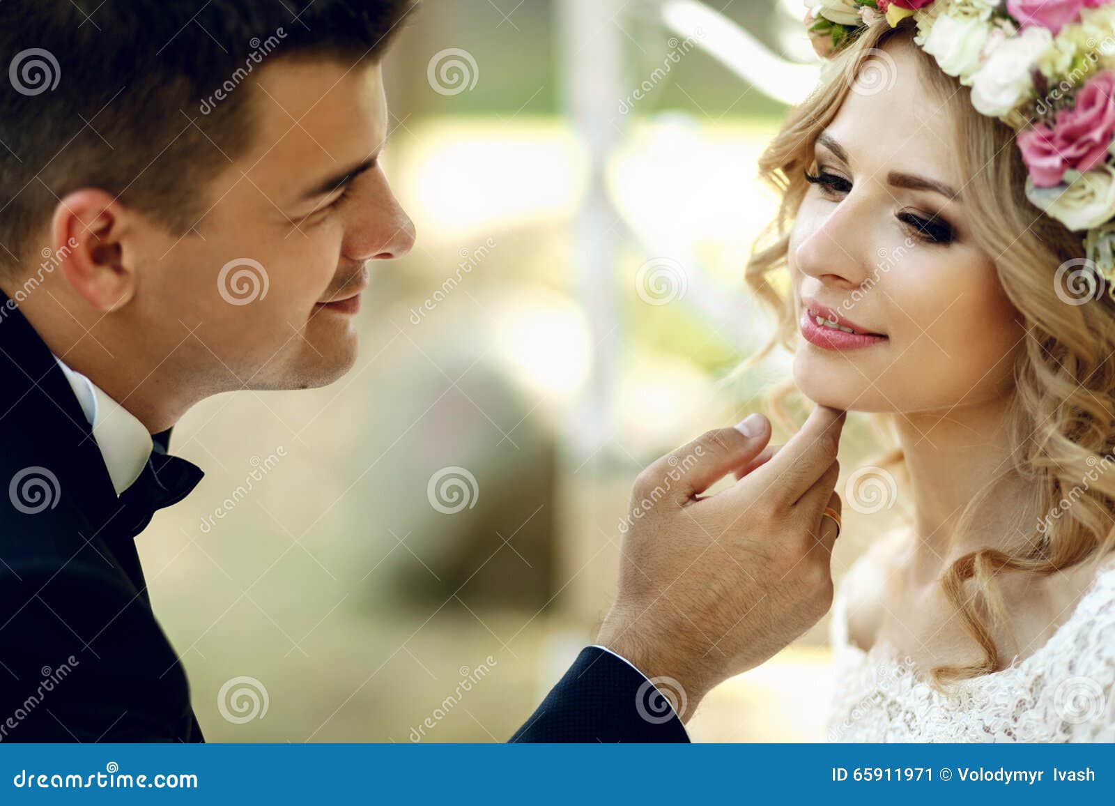 Handsome Groom Sensual Touching Emotional Happy Blonde Bride In Stock