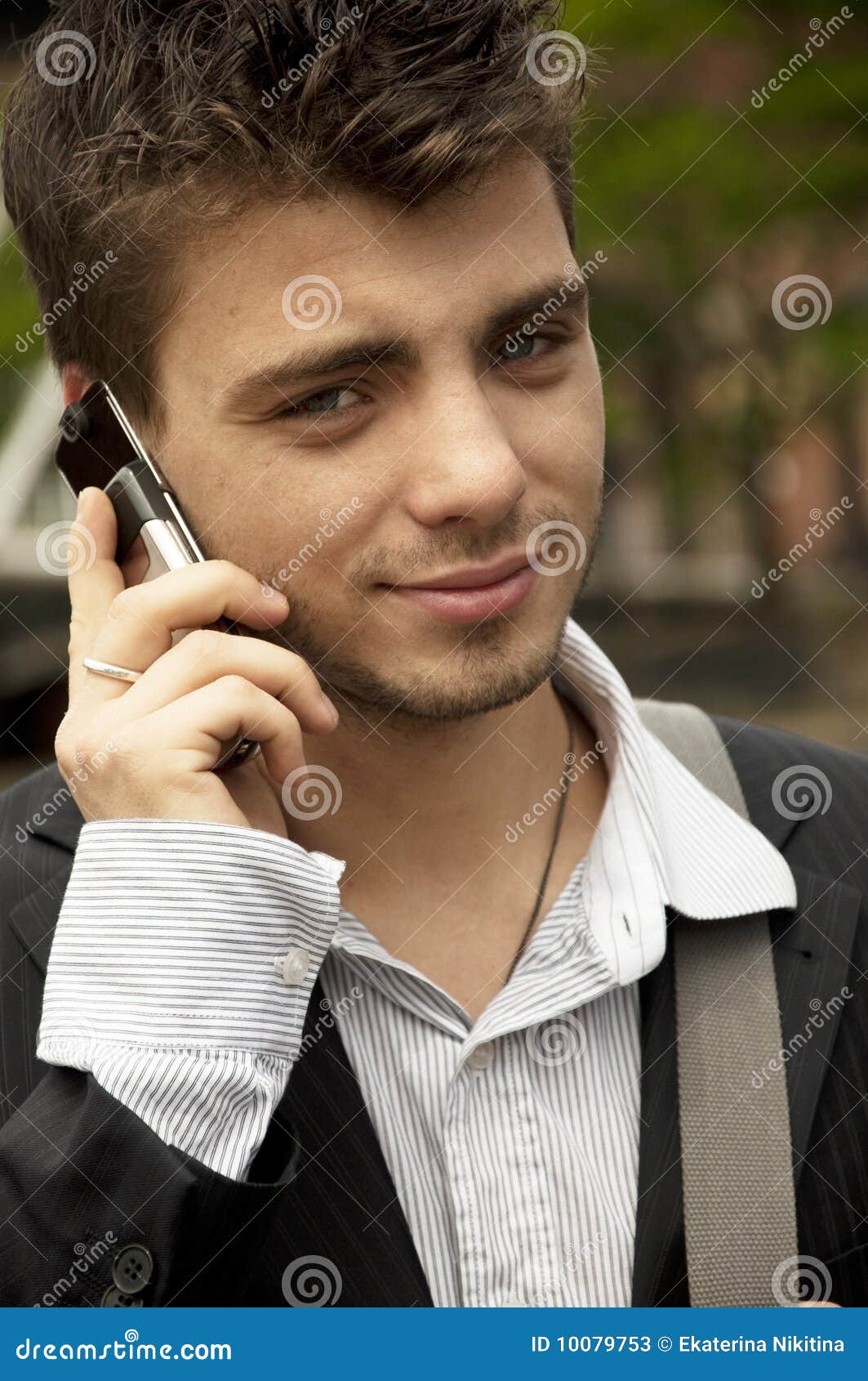 Handsome Guy with a Cell Phone Stock Image - Image of serious, portrait ...