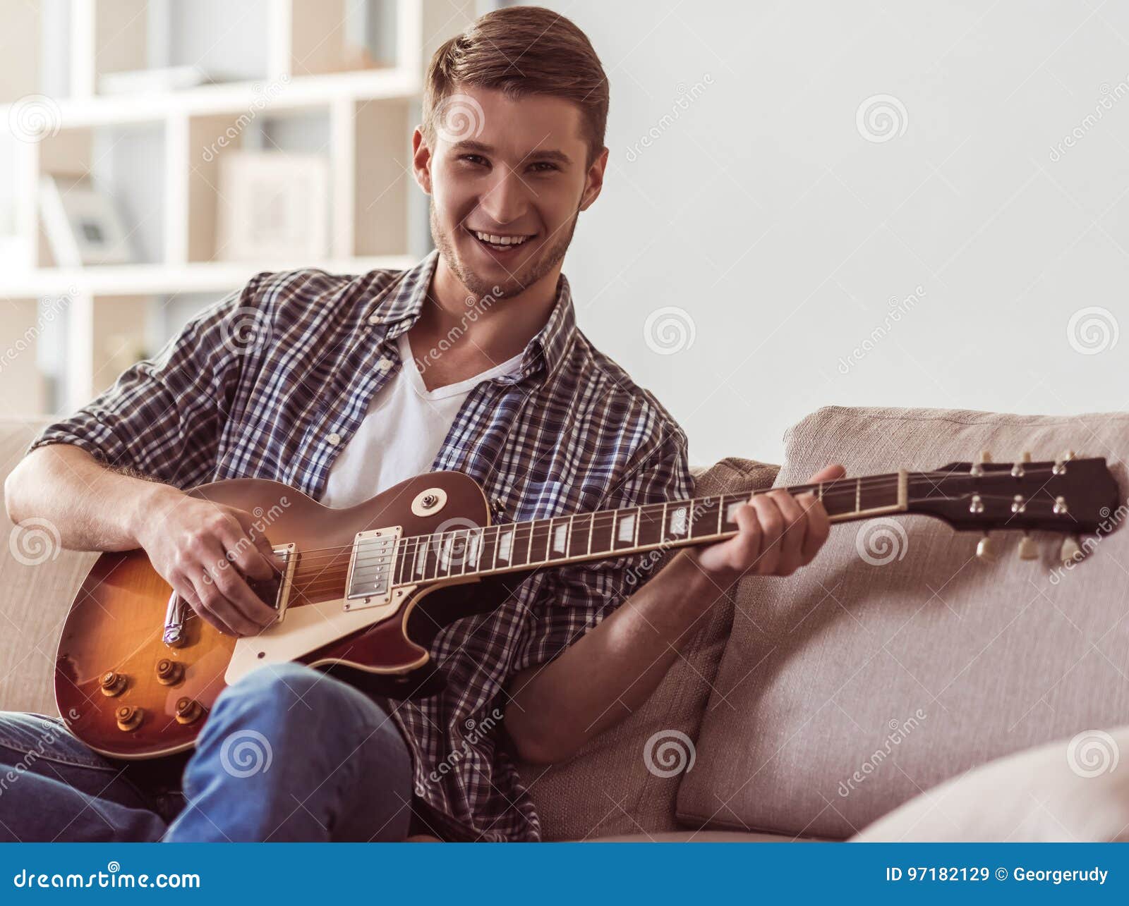 Handsome guy with guitar stock image. Image of home, happy - 97182129