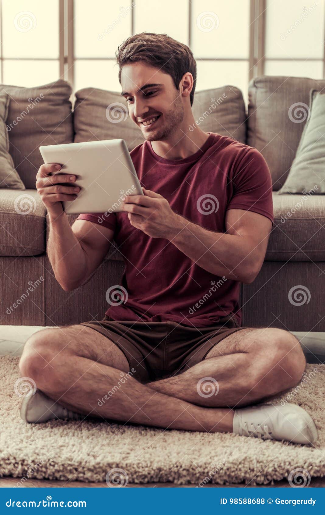 Handsome guy at home stock photo. Image of house, care - 98588688