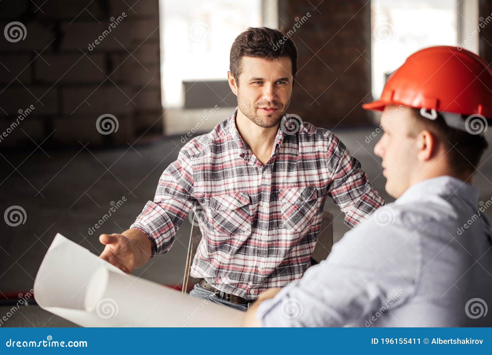 Handsome Guy Looking at the Engineer and Asking a Help Stock Image ...