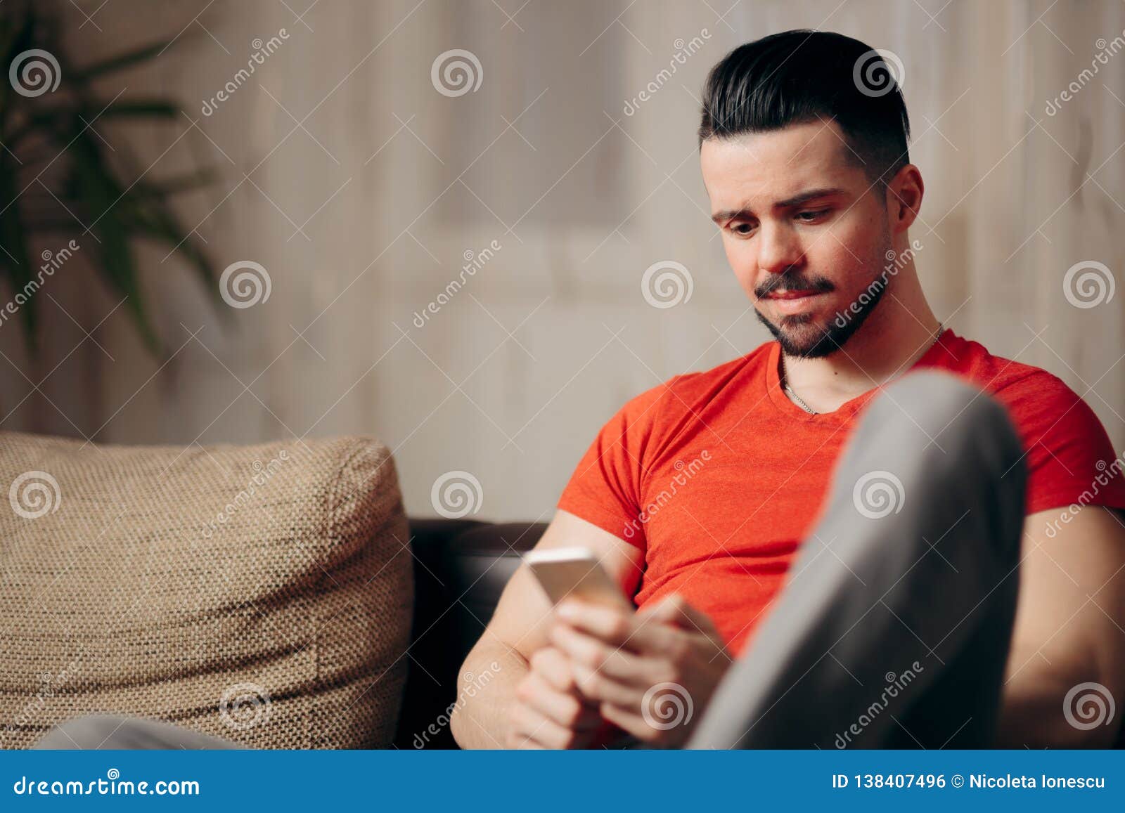 Man Reading Text Messages on His Smartphone Stock Photo - Image of ...