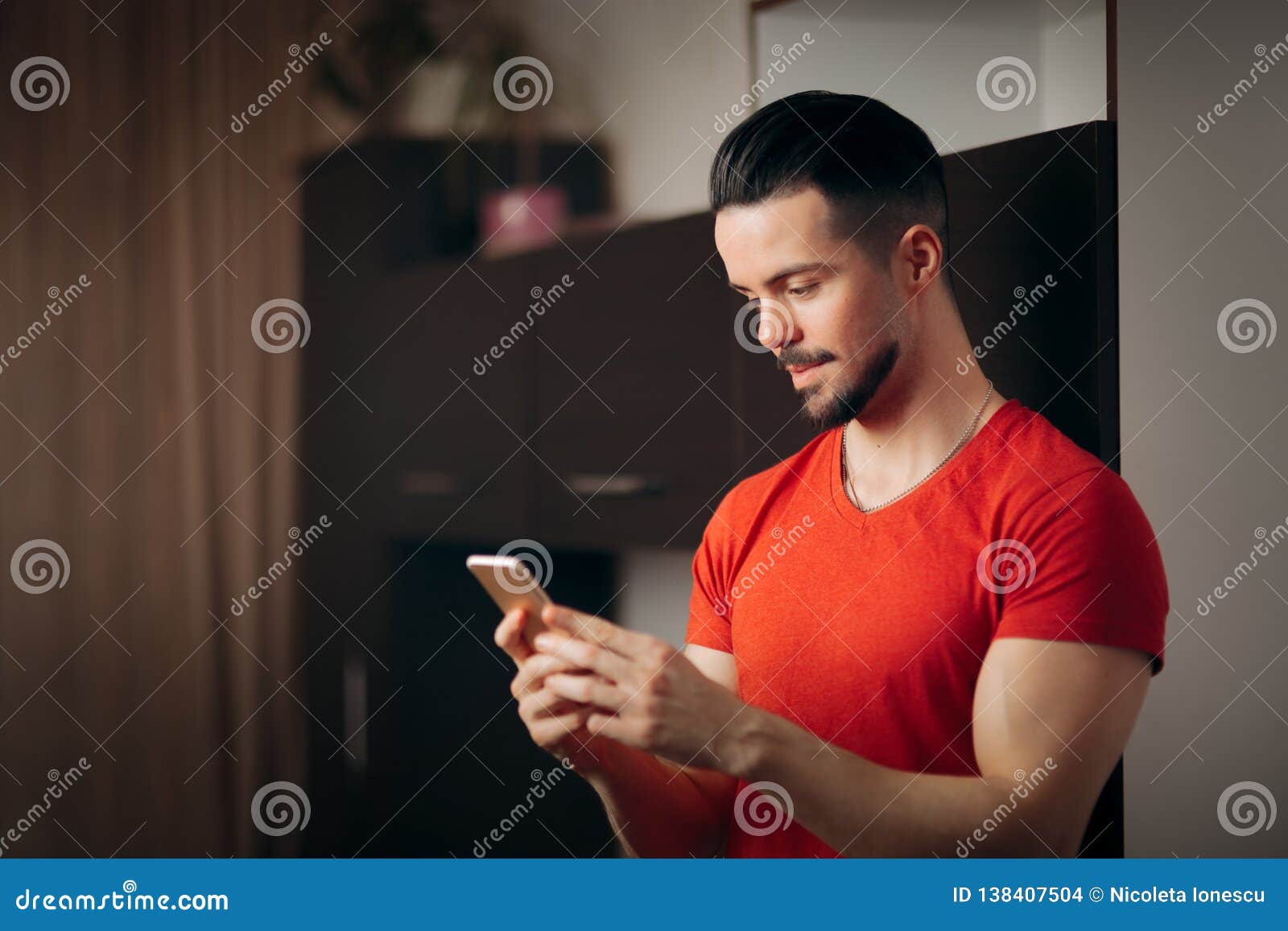 Man Reading Text Messages on His Smartphone Stock Photo - Image of ...