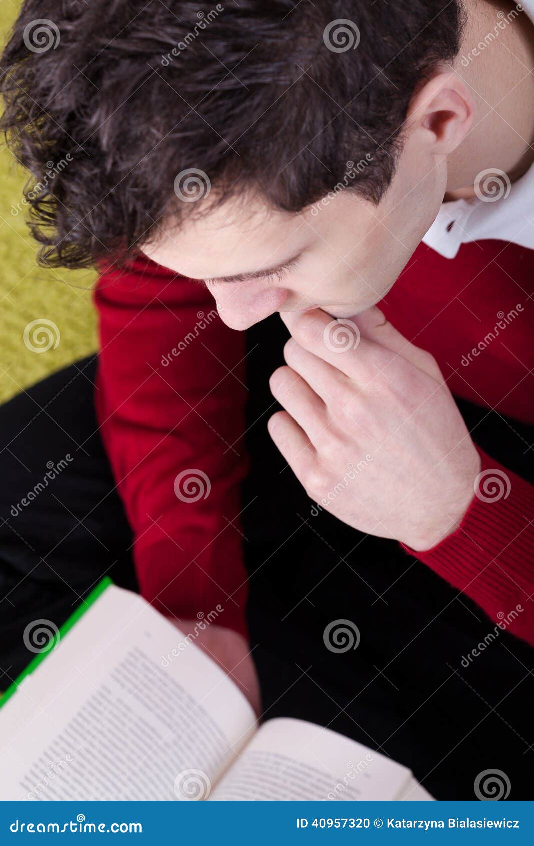 Handsome guy reading stock photo. Image of sitting, holding - 40957320