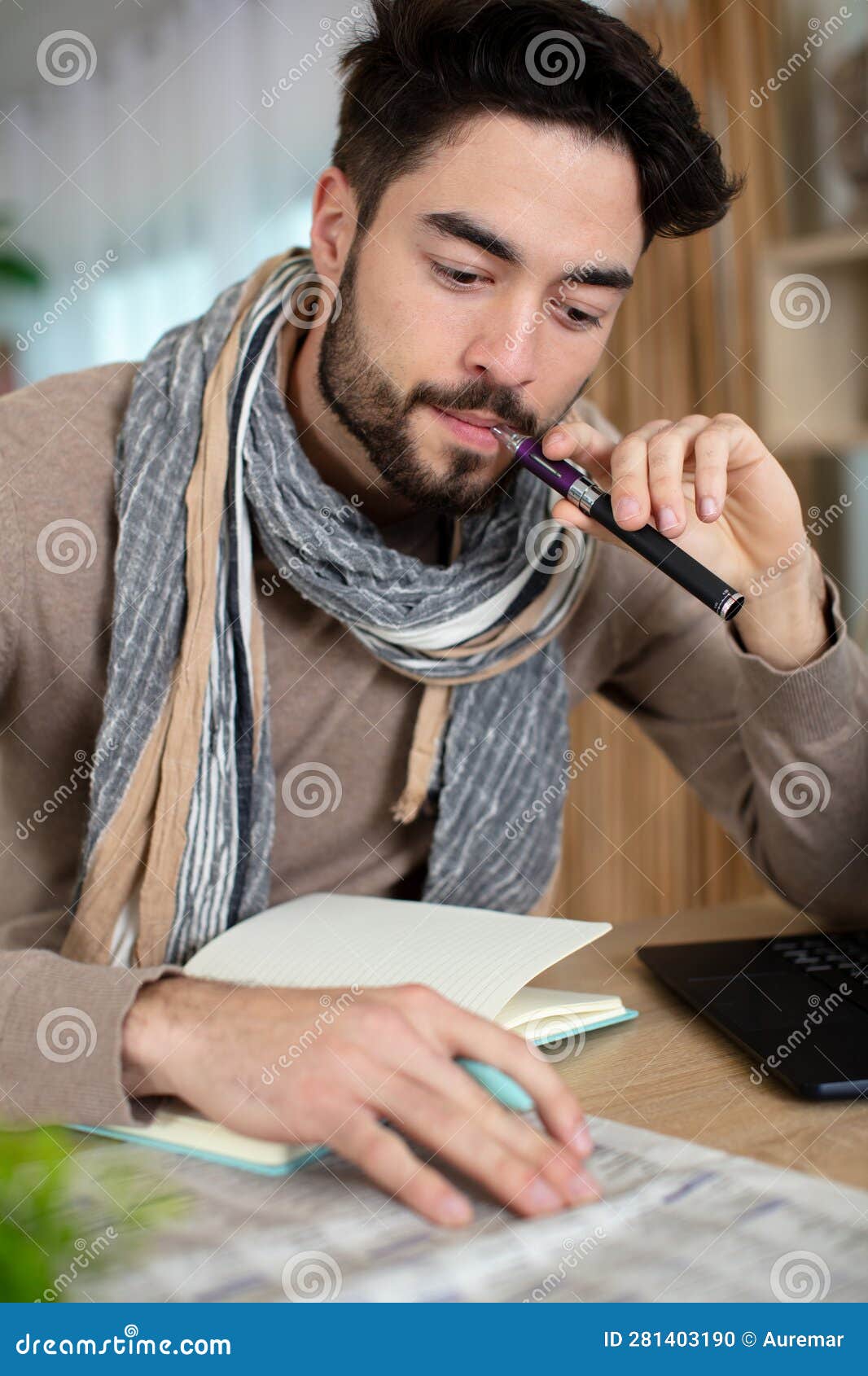 Handsome Guy Reading Newspaper Very Interested at Working Desk Stock ...