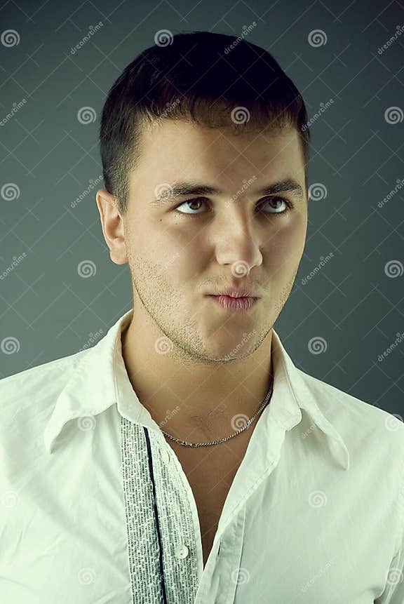Handsome Guy is Scheming Something Stock Photo - Image of emotion, cool ...