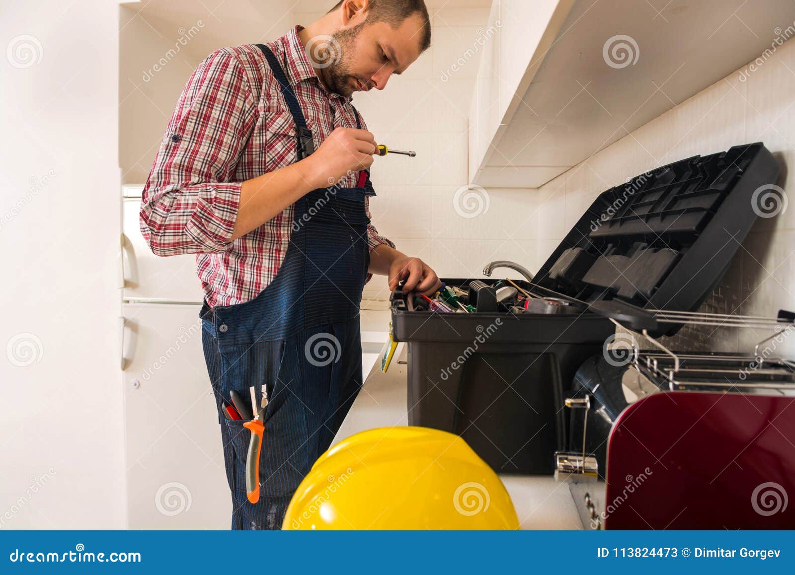 Handsome Guy Searching His Tool in the Kitchen Stock Image - Image of ...