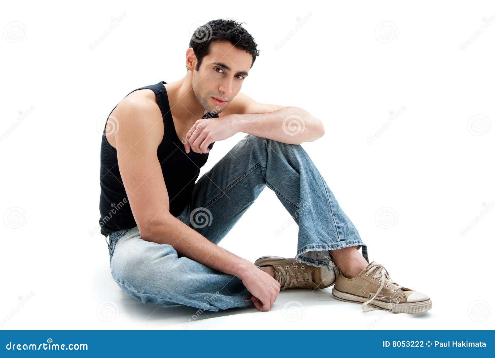 Handsome Guy Sitting on Floor Stock Photo - Image of caucasian, jean ...