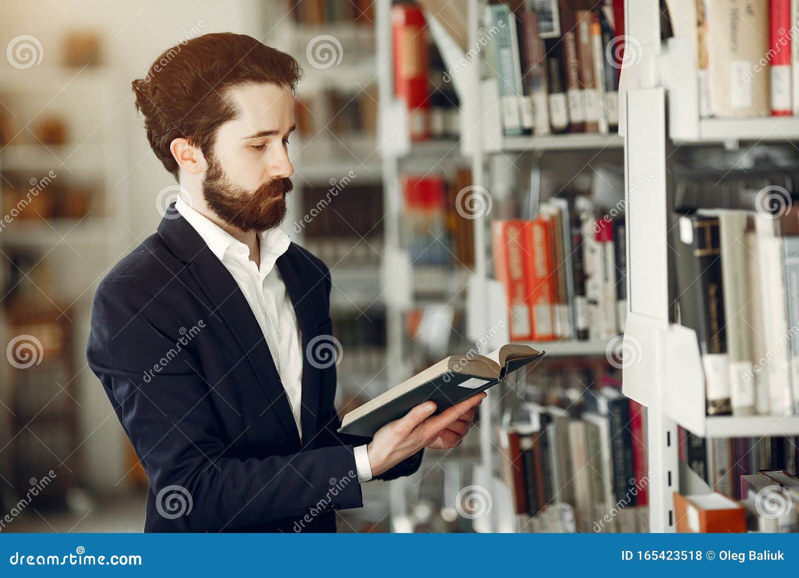 Handsome Guy Study at the Library Stock Photo - Image of expertise ...